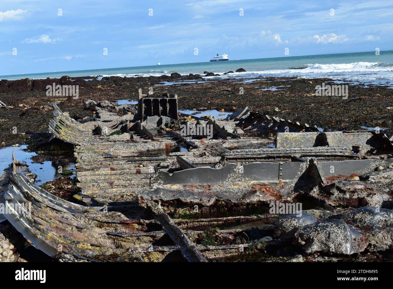 Close-up of the metal wreckage of the SS Falcon on the beach at the ...