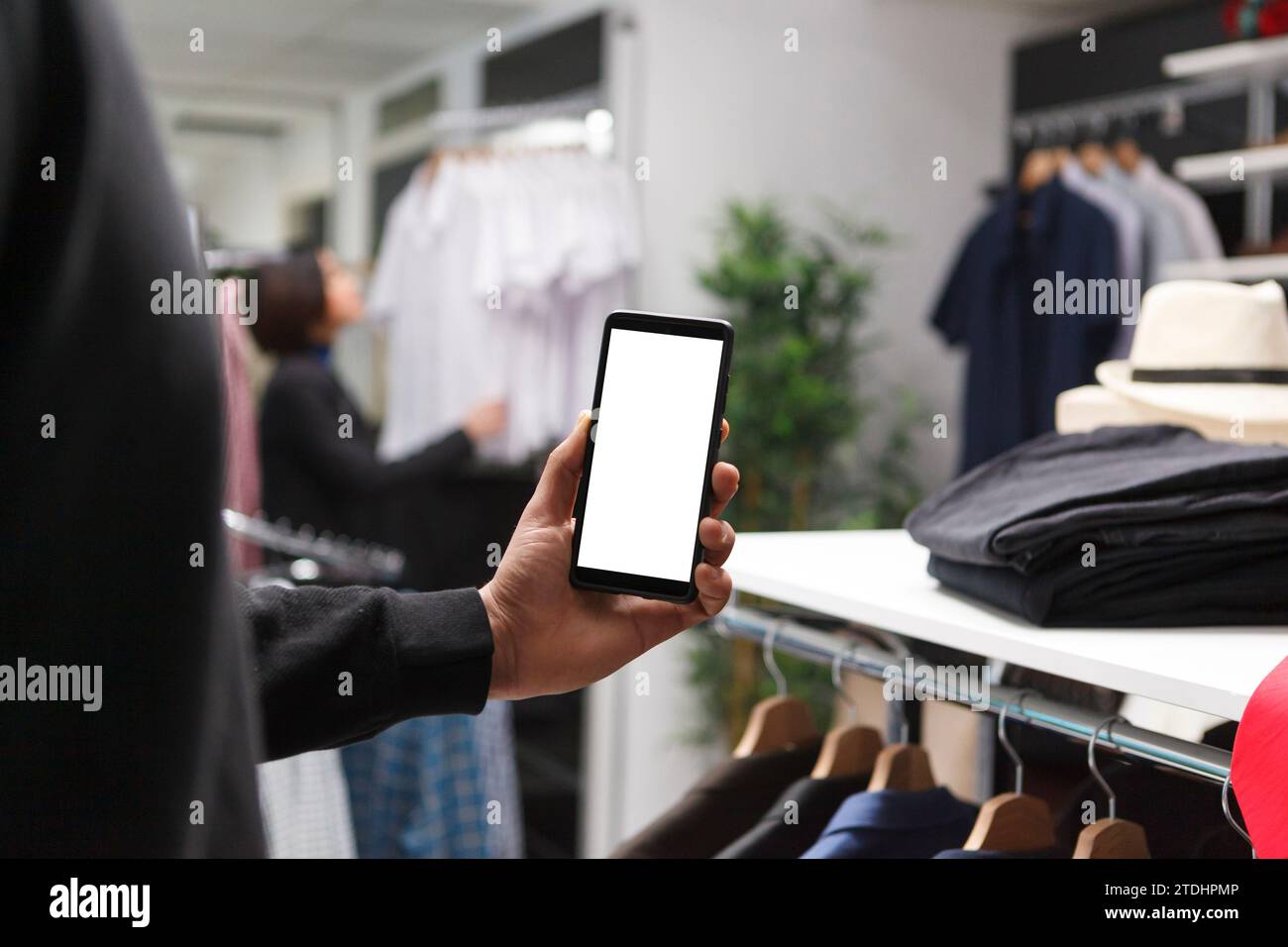 Clothing store client showing smartphone blank white screen mockup for ...