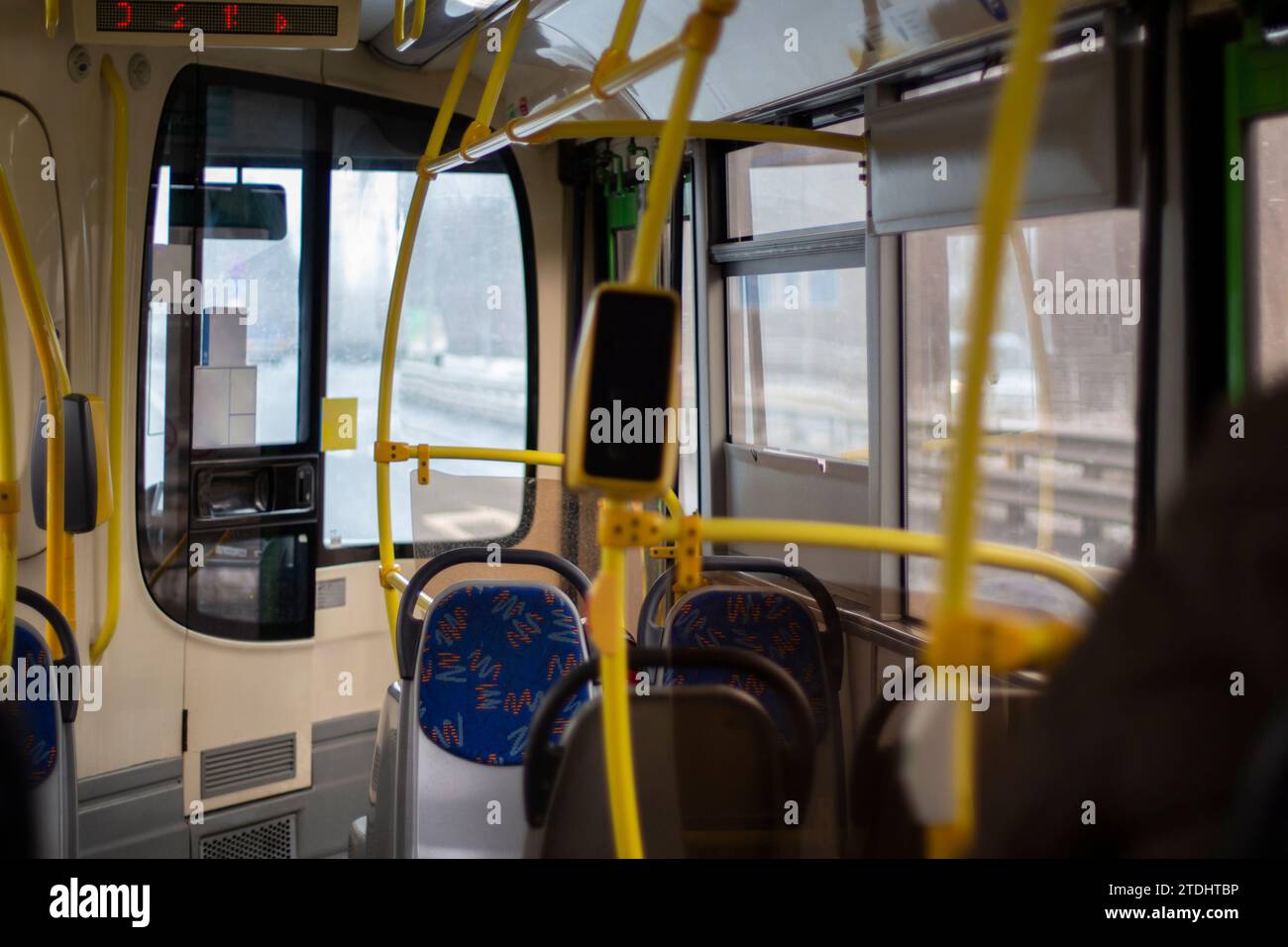 The interior of a modern bus. Public transport inside. Bus fare ...