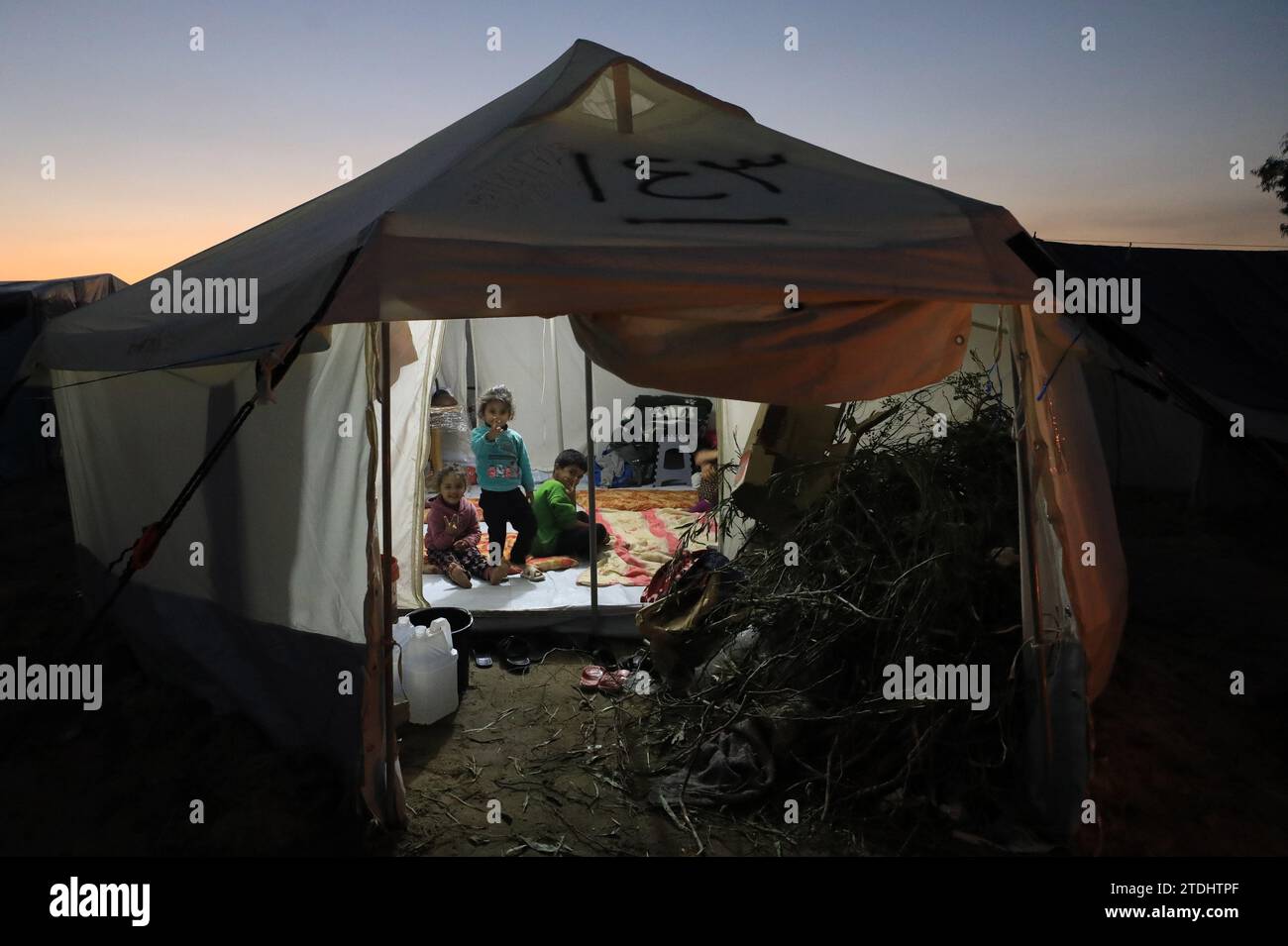 Gaza. 18th Dec, 2023. Displaced Palestinian children are seen inside a ...