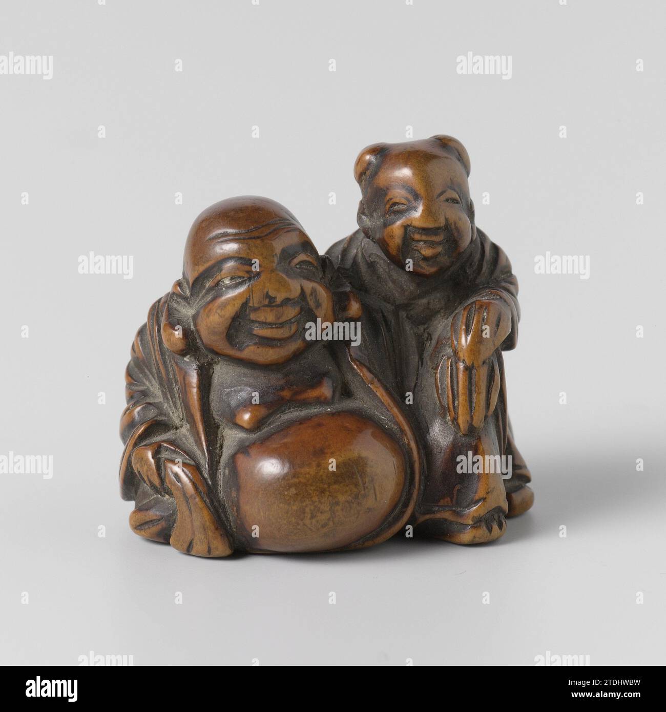 Netsuke,, c. 1700 --c. 1850 The lucky god Hotei and a Chinese boy ...