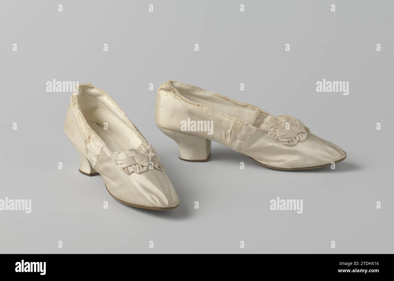 Ladies shoe of ivory white satin with tie with multiple loops and in ...