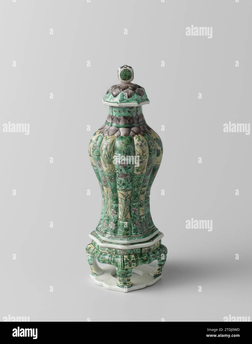 Covered vase with stand, modelled in bamboo-shaped sections with flower ...