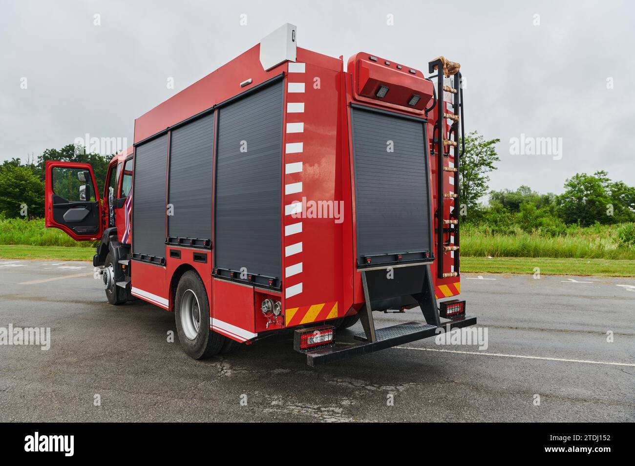 In this captivating scene, a state-of-the-art firetruck, equipped with ...