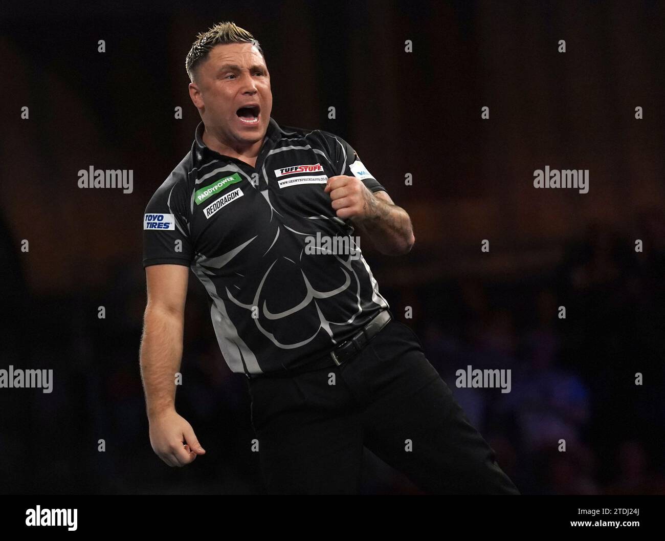 Gerwyn Price celebrates his win over Connor Scutt on day four of the ...