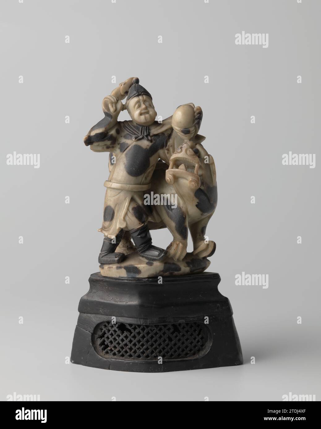 Image of a man and a Buddhist lion ,, 1750 - 1800 Statue of a man and a ...