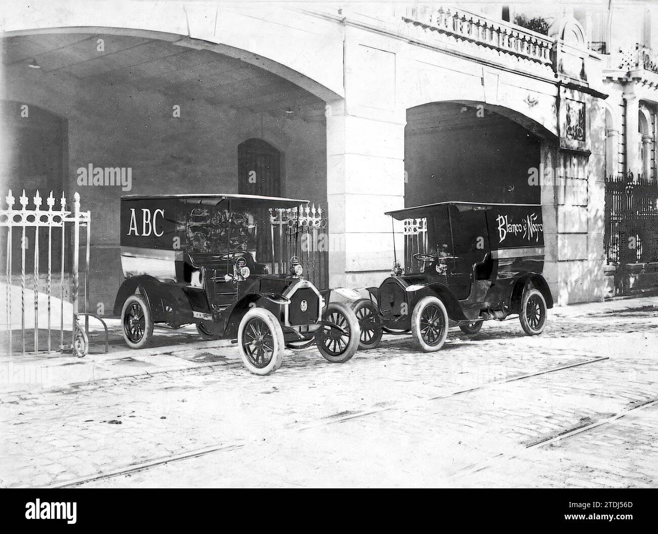 The black and white and ABC automobiles that transported the copies to ...