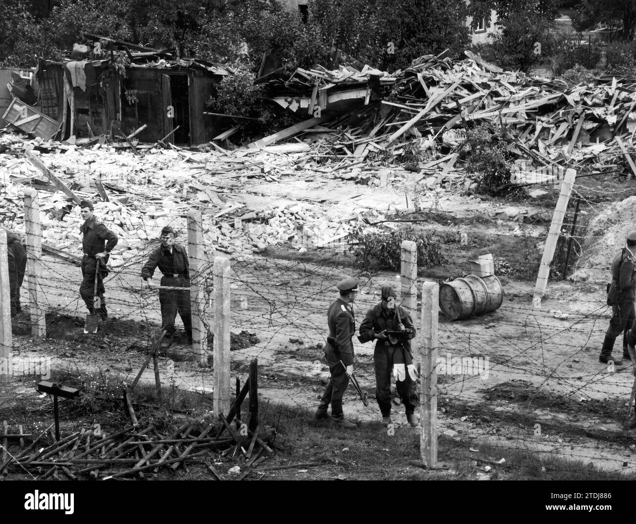 Berlin, 1962. In areas where barbed wire fences replace the cement ...