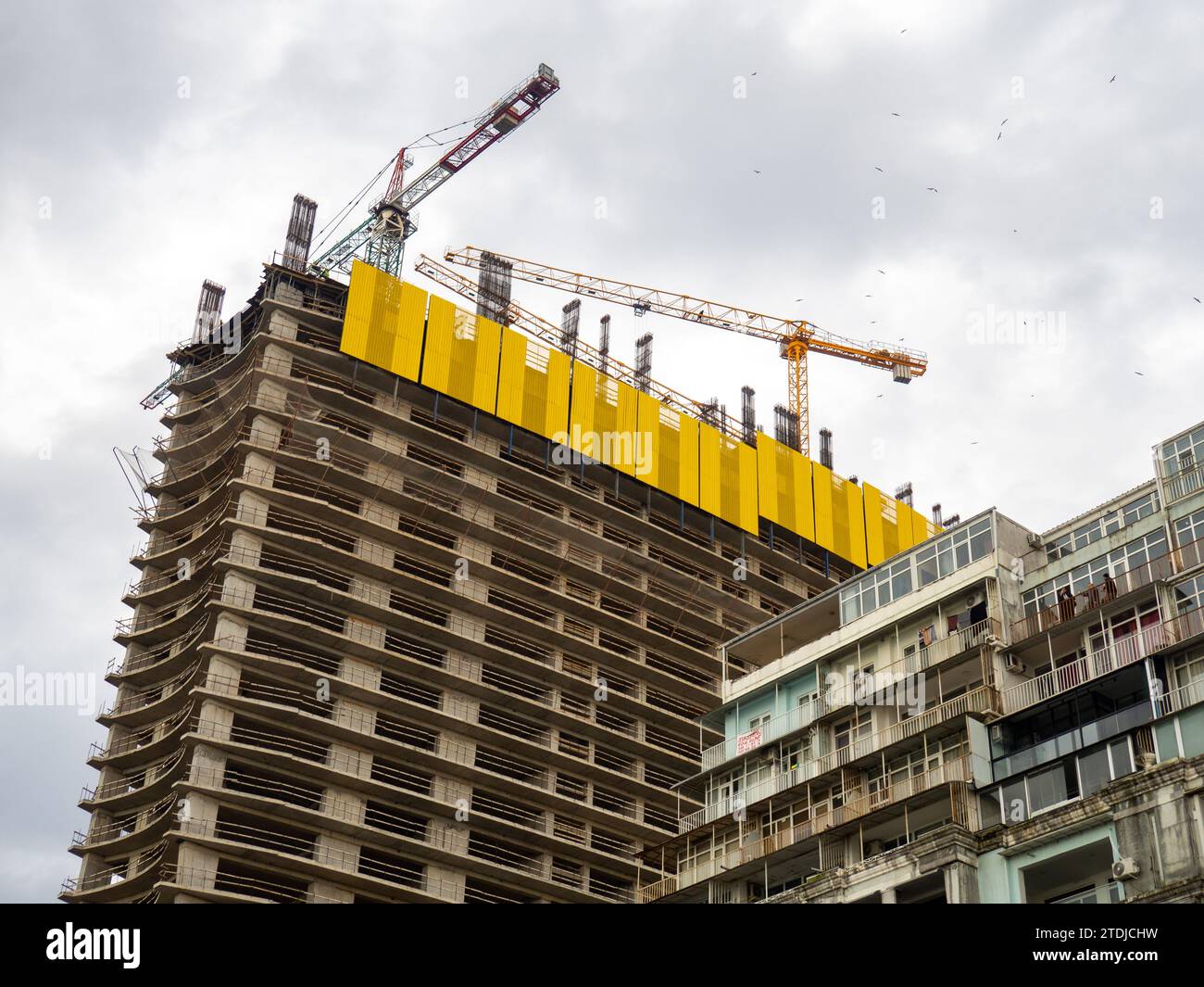 Modern construction of a high-rise building. Construction site and ...