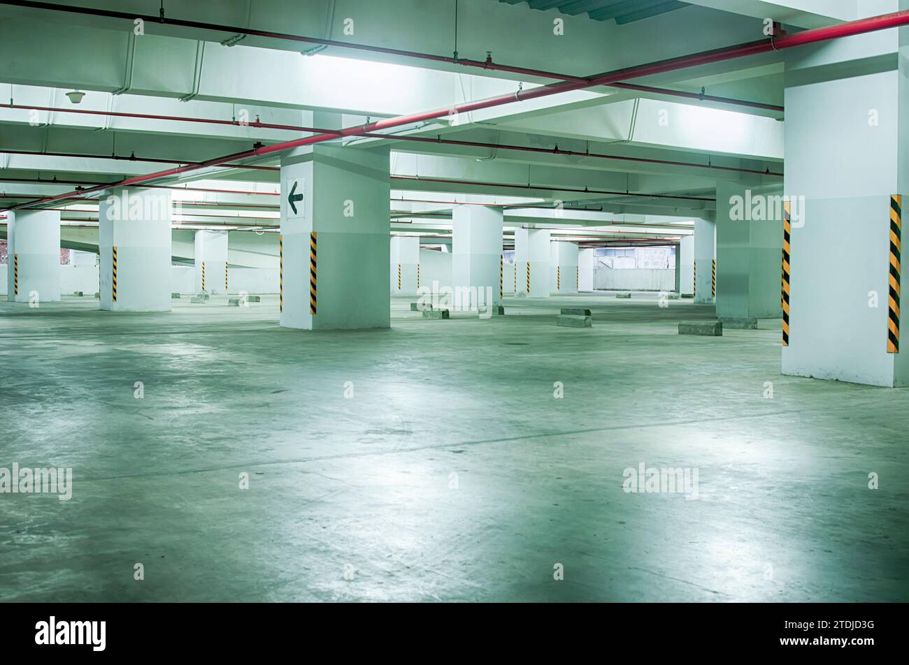 car parking area in the basement of a building Stock Photo - Alamy