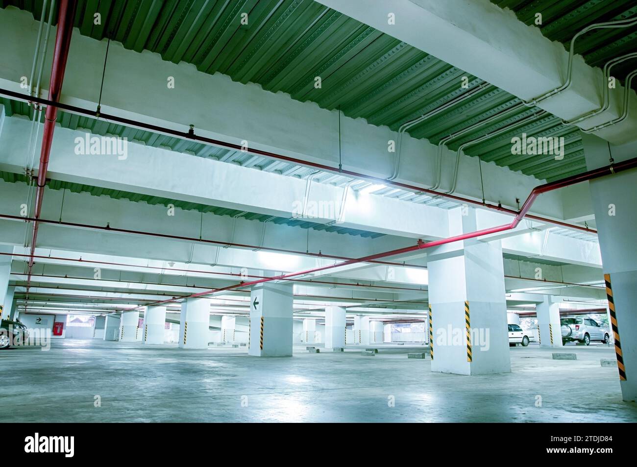car parking area in the basement of a building Stock Photo - Alamy
