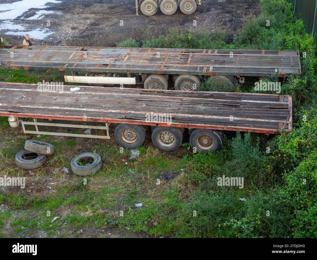 Old truck wagons. Abandoned transport. Old trailers without top Stock ...