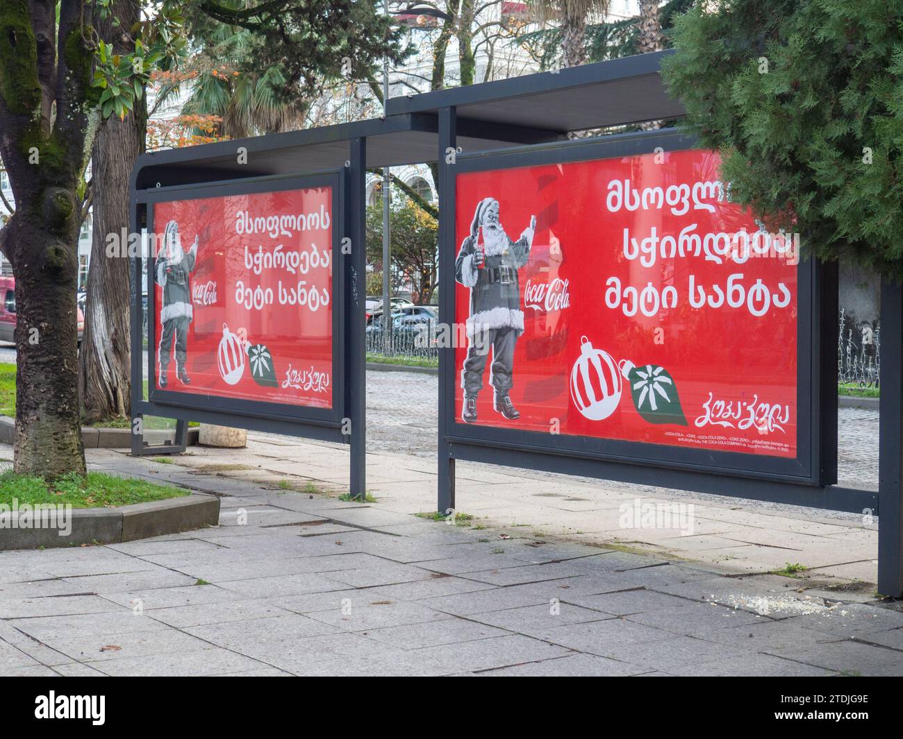 Advertising Coca Cola at a bus stop. Coca Cola advertising in Georgia ...