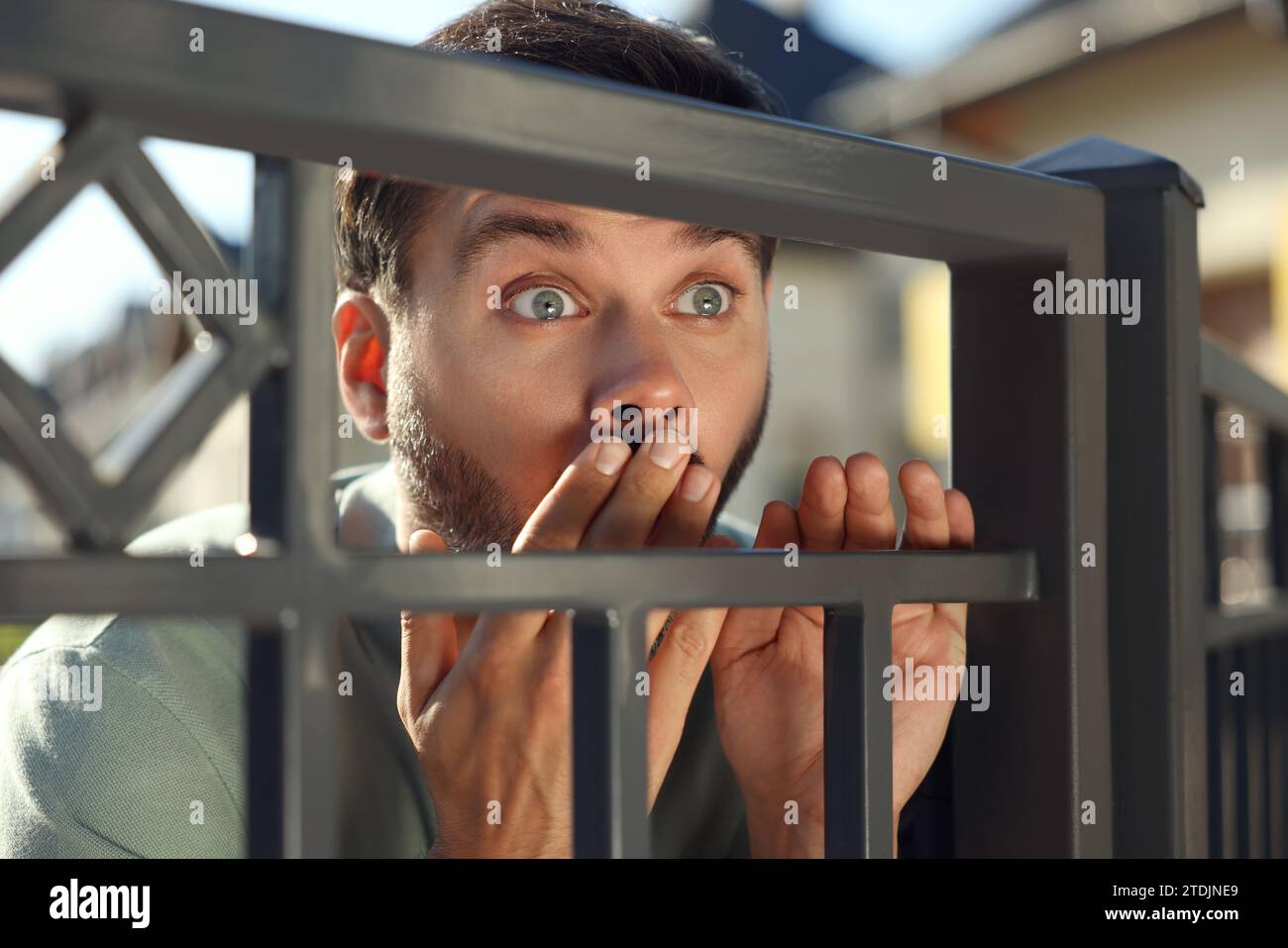 Spying on neighbours hi-res stock photography and images - Alamy