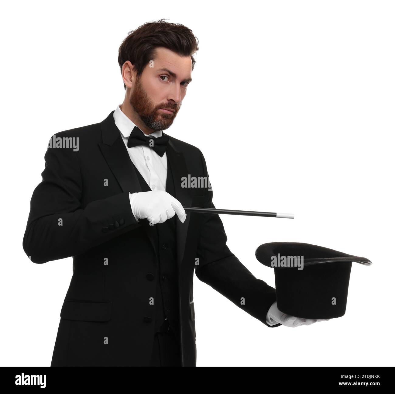 Magician showing magic trick with top hat on white background Stock ...