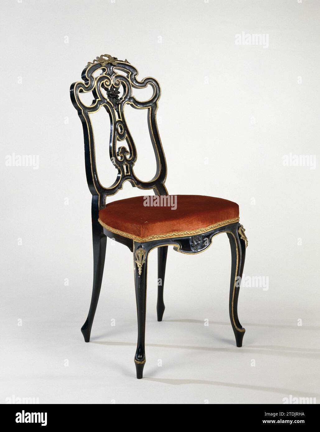 Chair, alternately shiny and dull black painted and decorated with ...