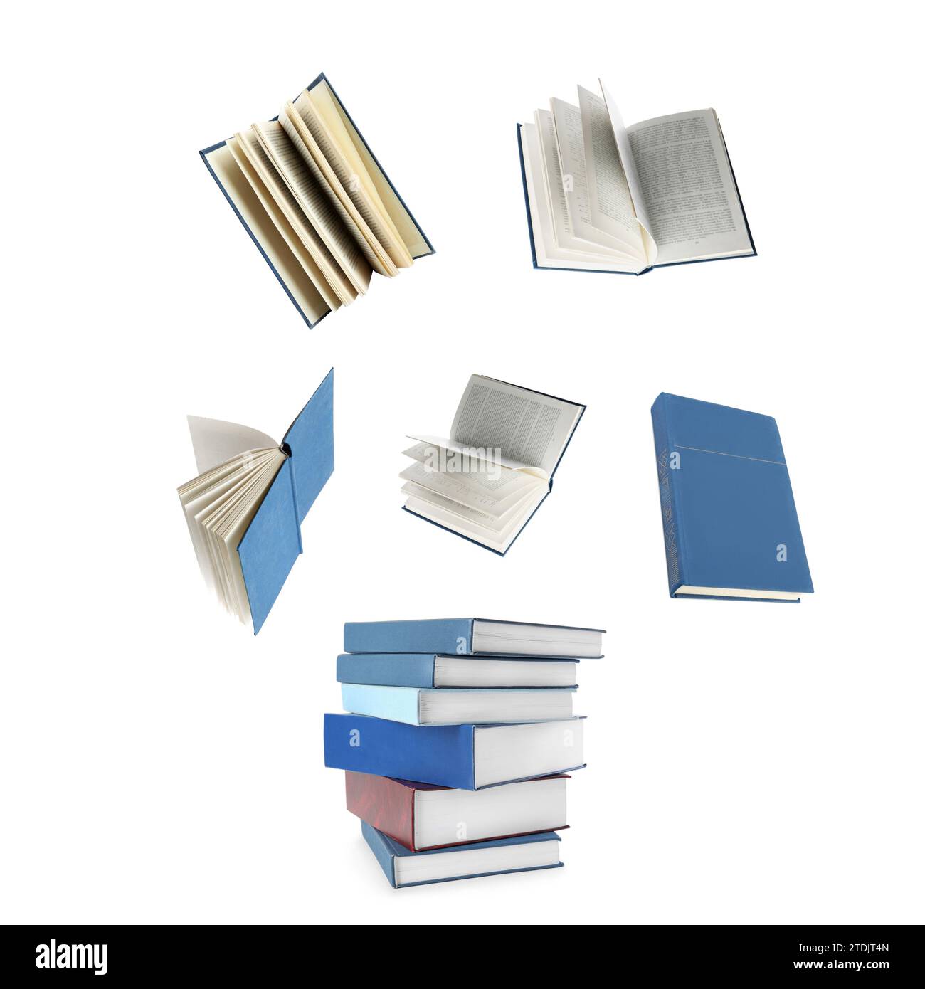 Books flying over stack on white background Stock Photo - Alamy