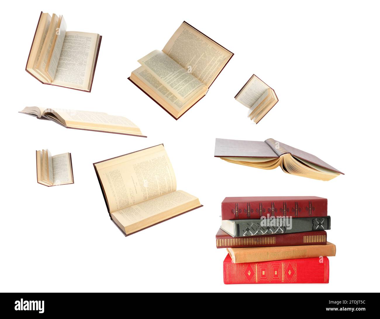 Books flying over stack on white background Stock Photo - Alamy