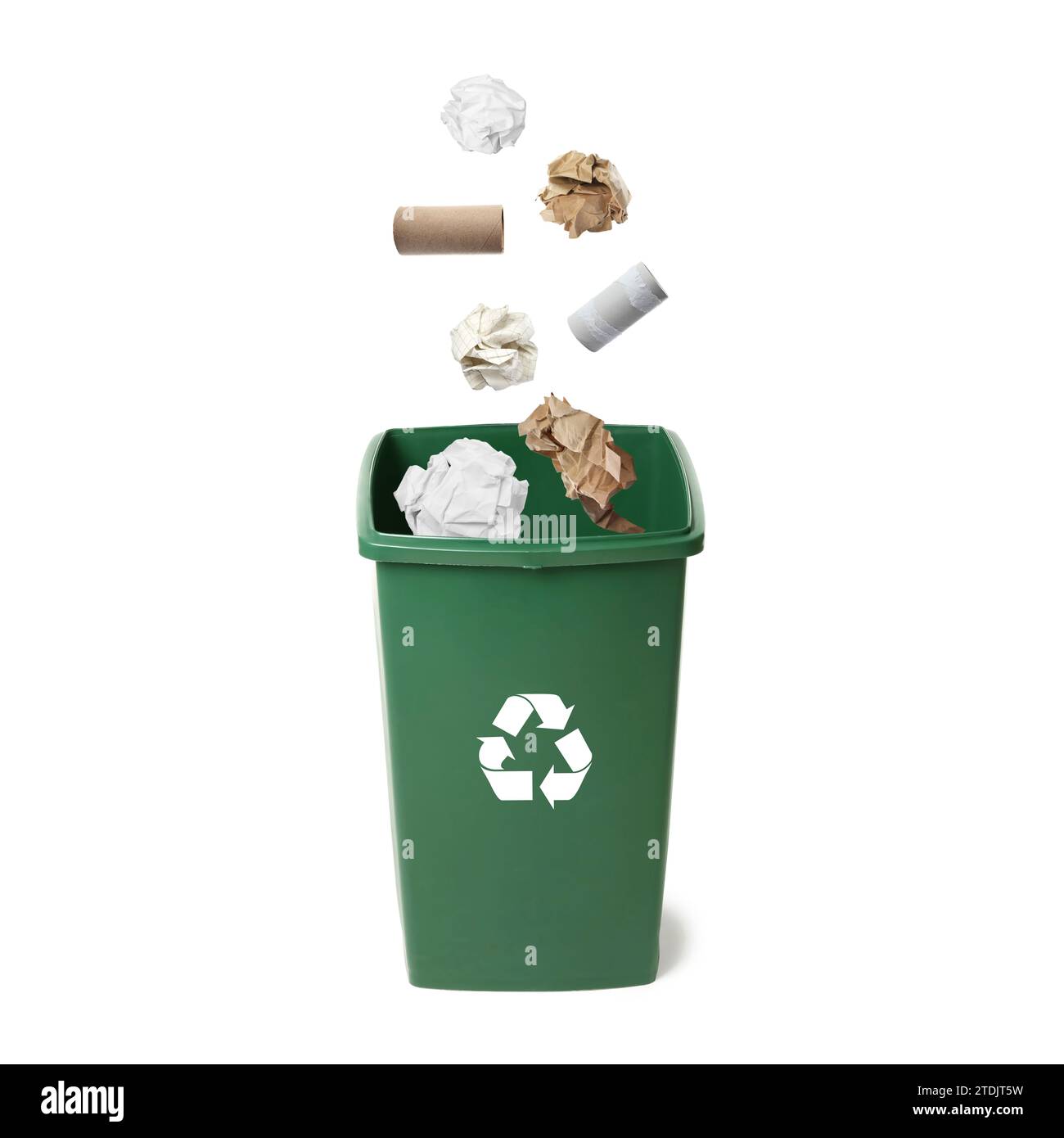 Garbage falling into trash bin on white background Stock Photo - Alamy