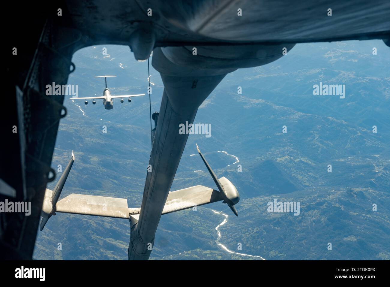 A C-5M Super Galaxy approaches the boom of a KC-10 Extender to perform ...