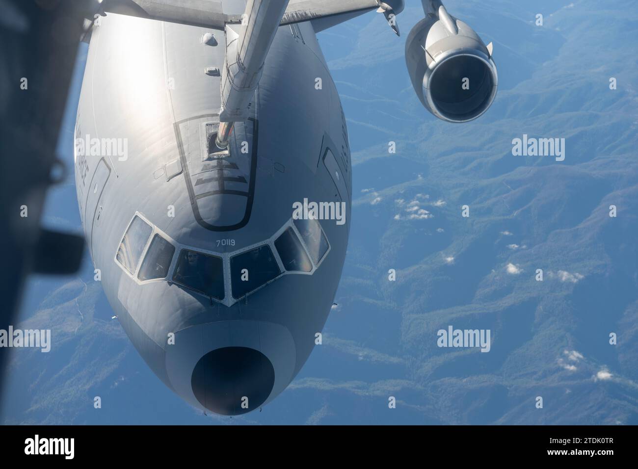 A KC-10 Extender approaches the boom of another KC-10 to perform ...
