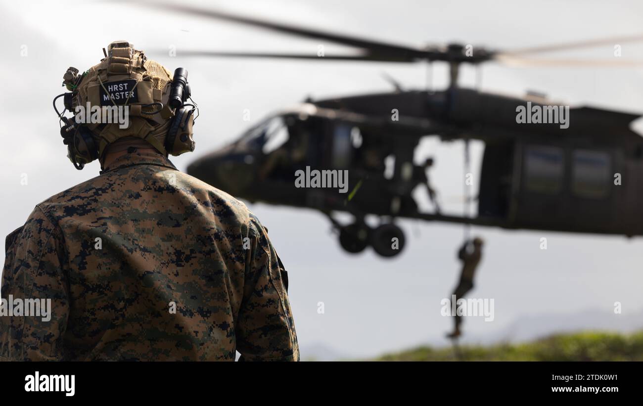 U.S. Marine Corps Cpl. Nathan Fiorucci supervises helicopter insertion ...