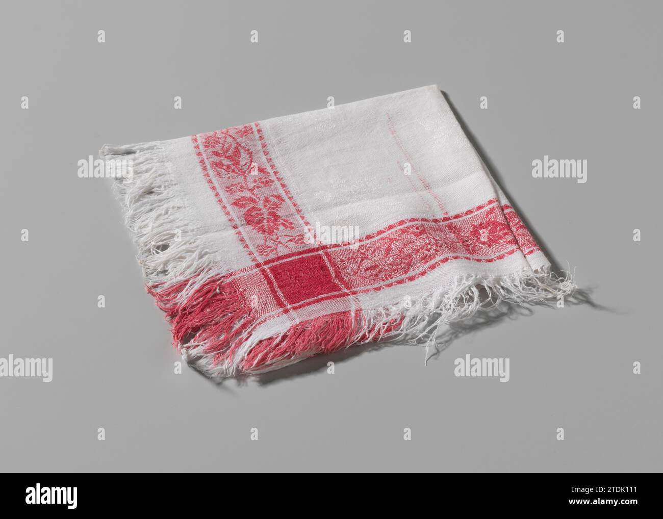 Cotton damask finger cloth with rose pattern and trimmed with a red ...