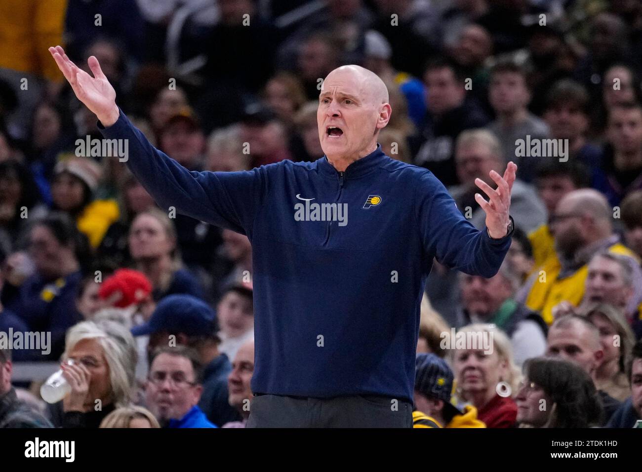 Indiana Pacers head coach Rick Carlisle gestures after he was charged ...