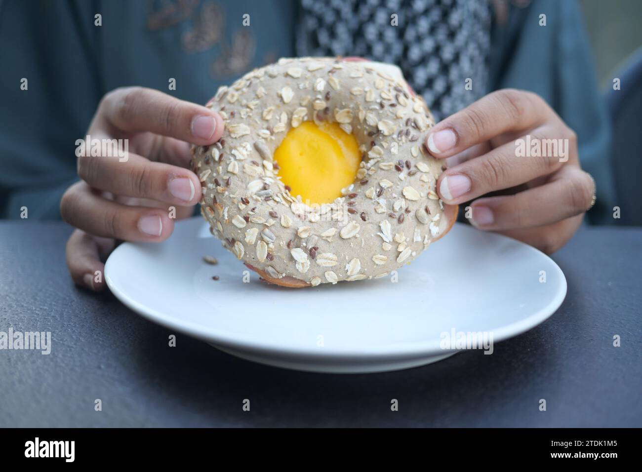 hamburger covered with melted cheese Stock Photo - Alamy