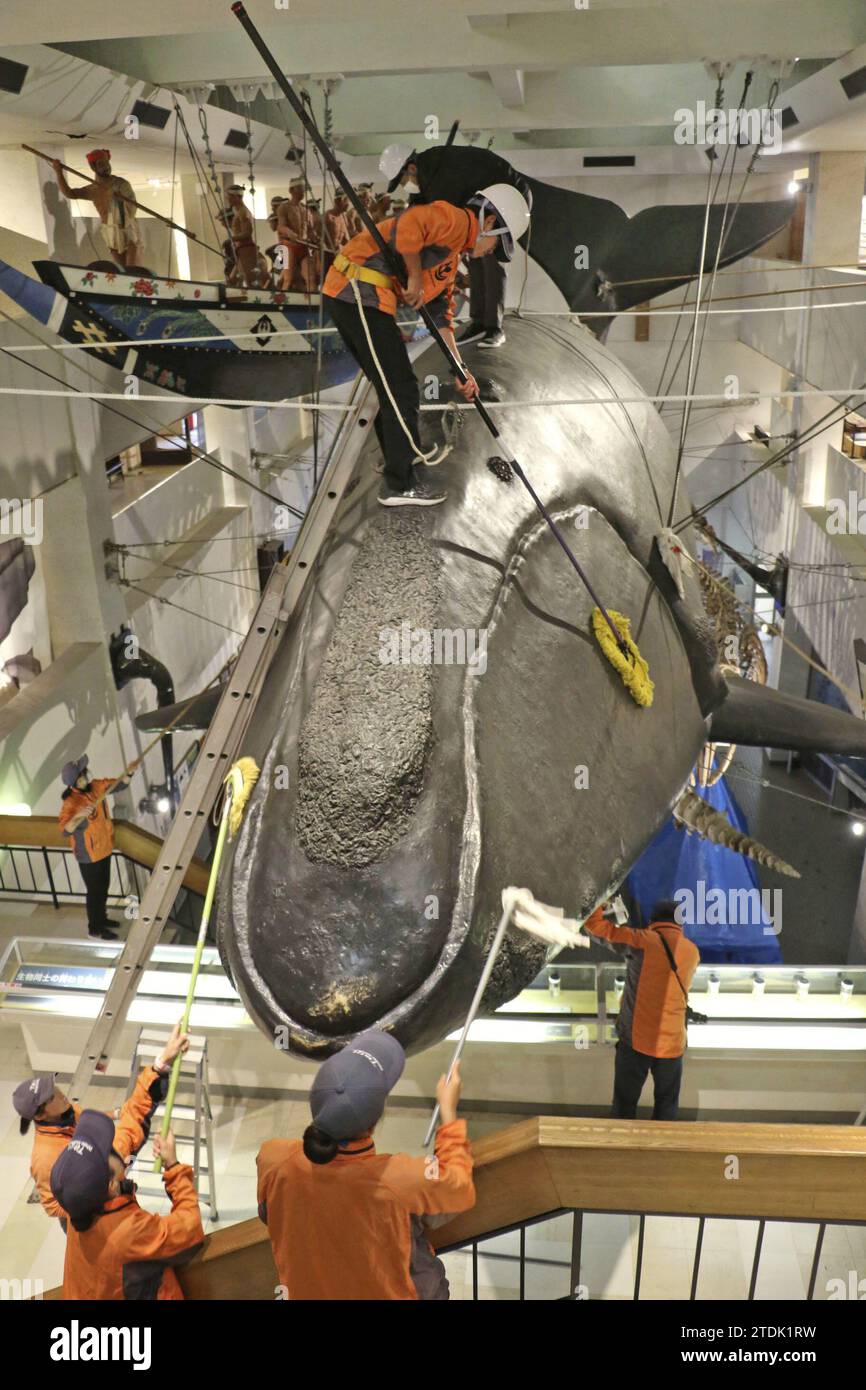 Staff clean a life-size model of a right whale at the Taiji Whale ...