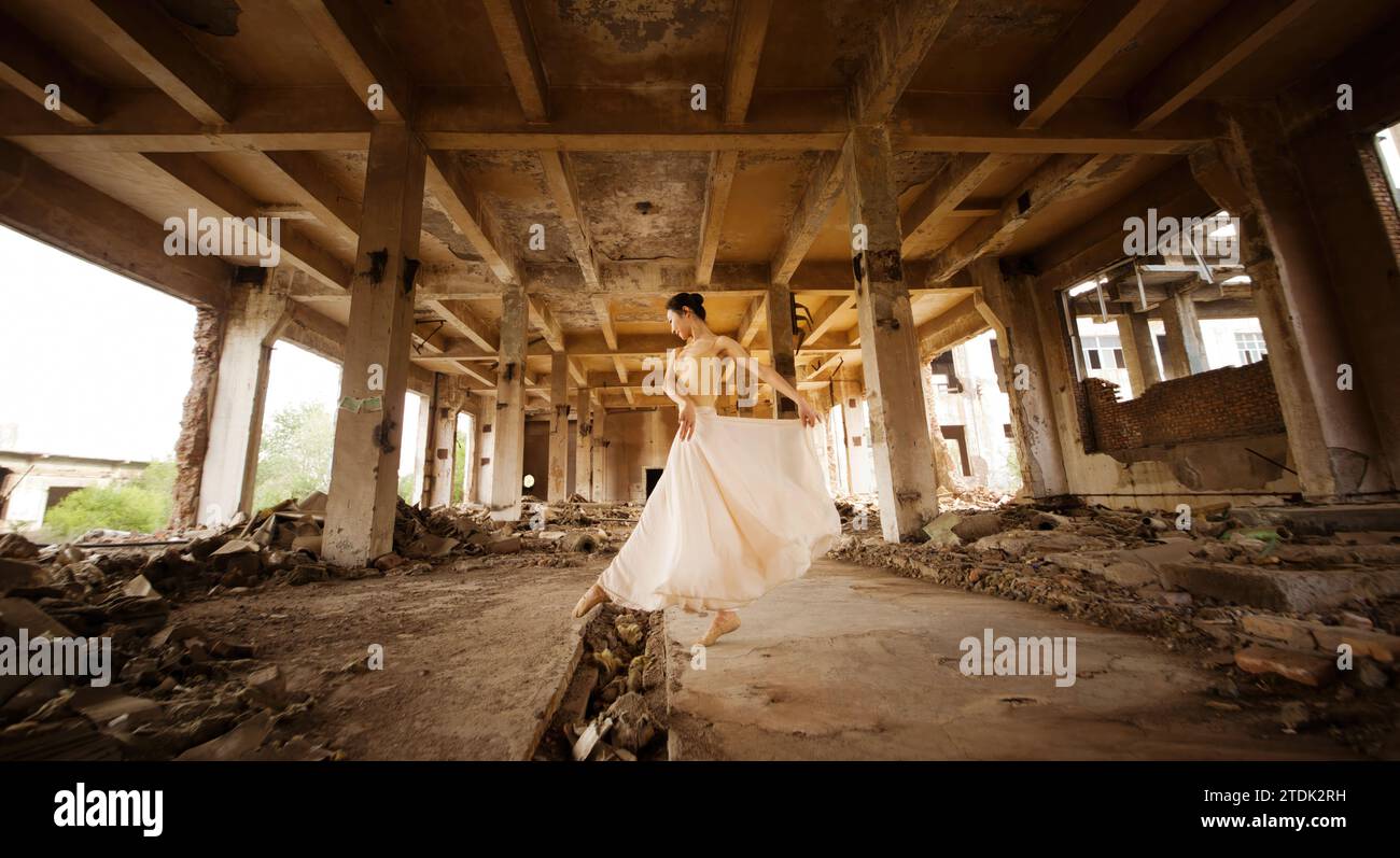 Couple dancing ballet in the dark studio Stock Photo - Alamy