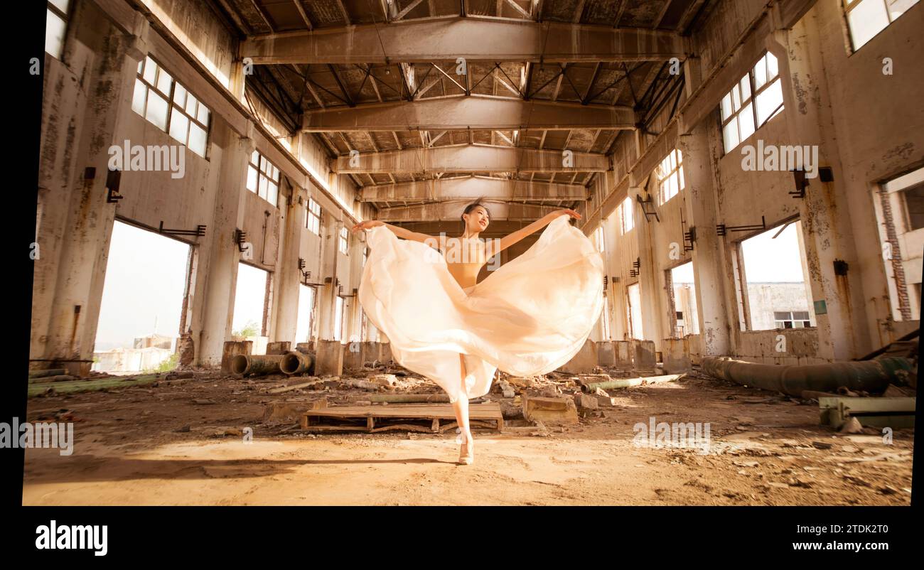 Couple dancing ballet in the dark studio Stock Photo - Alamy