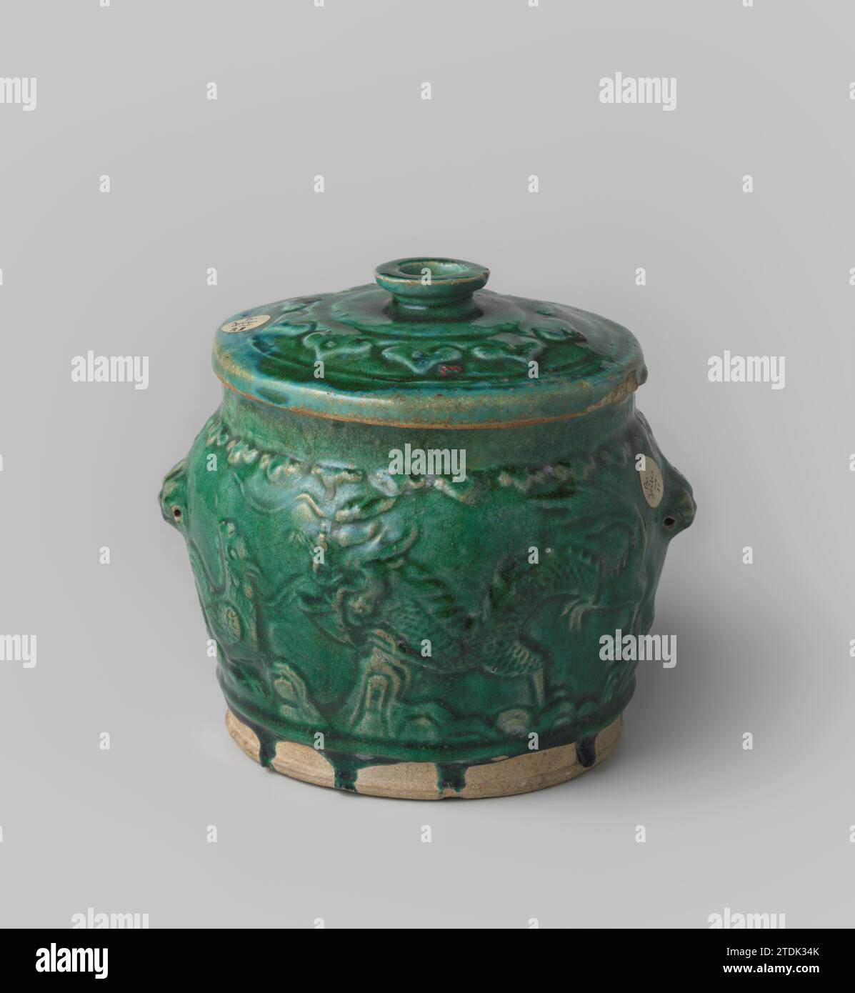 Pot lid, green glazed with relief ,, c. 1850 - c. 1950 Pot lid, of ...