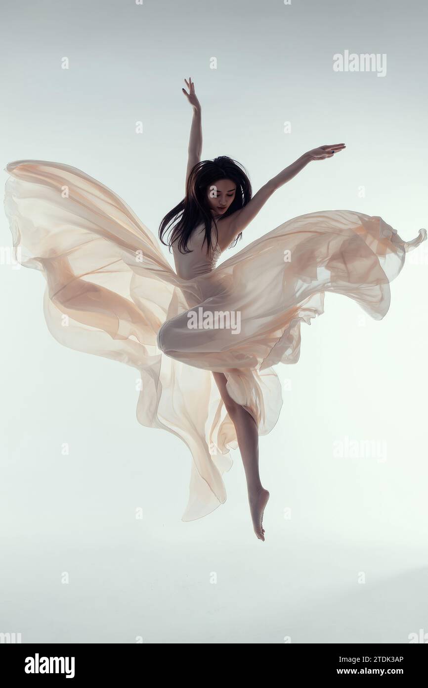 Beautiful girl combining contemporary dance and ballet Stock Photo - Alamy