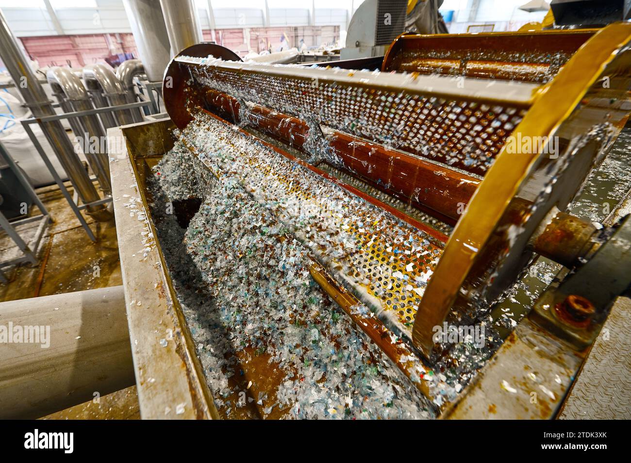 Bath for washing shredded plastic Stock Photo - Alamy