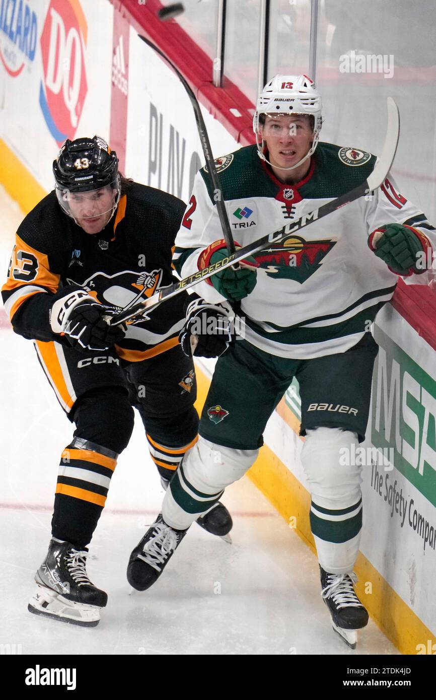 Pittsburgh Penguins' Jansen Harkins (43) checks Minnesota Wild's Matt ...