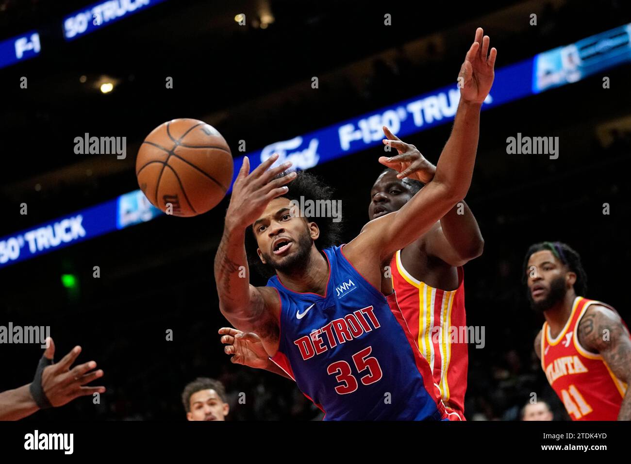 Detroit Pistons forward Marvin Bagley III (35) and Atlanta Hawks center Clint Capela (15) battle ...