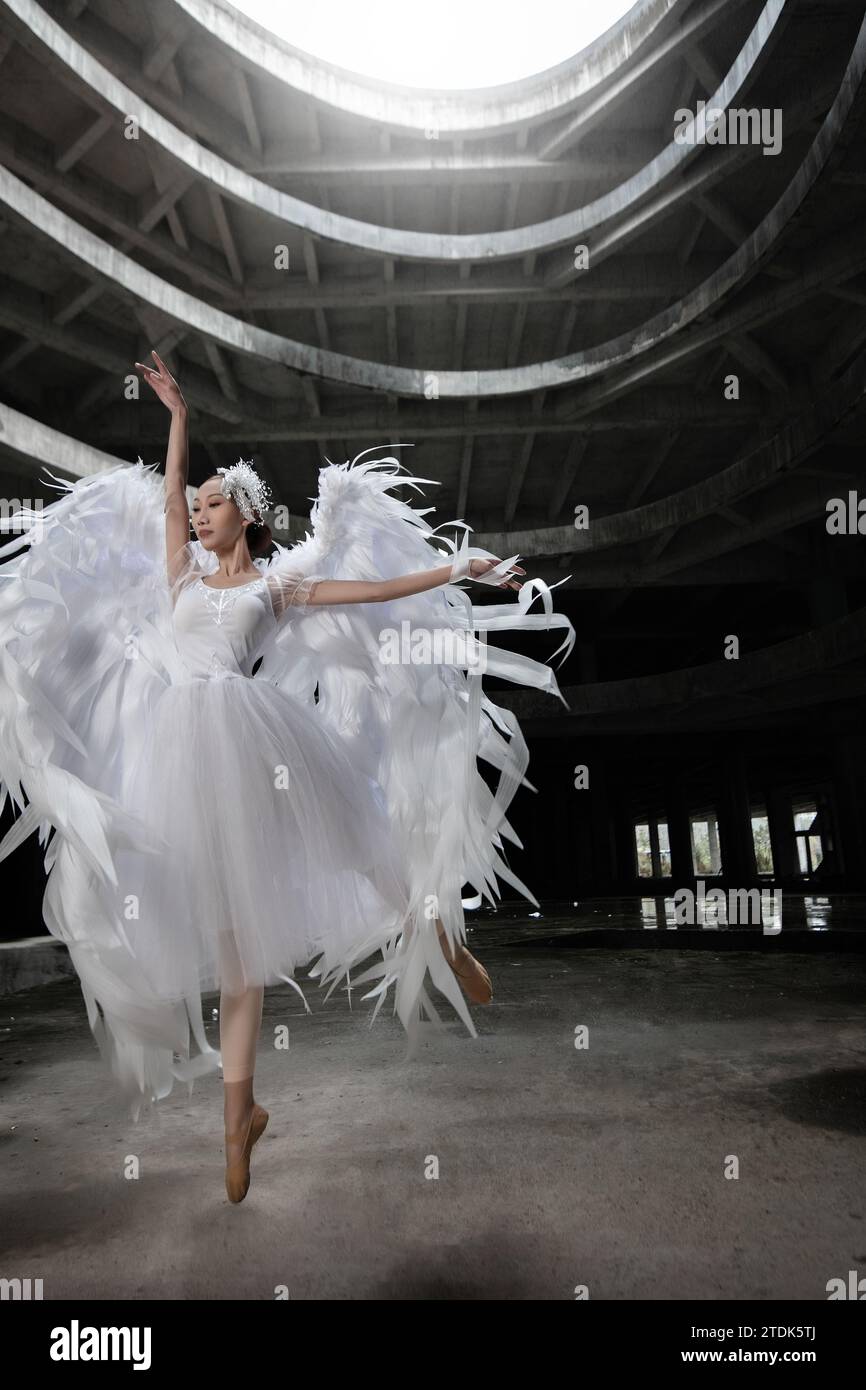 Asian dancers are dancing ballet in a building, images of ballet, dance ...