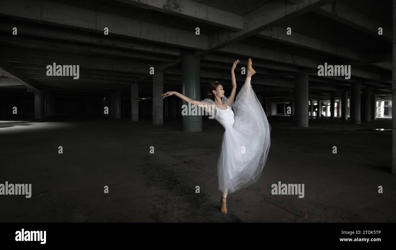Asian dancers are dancing ballet in a building, images of ballet, dance ...