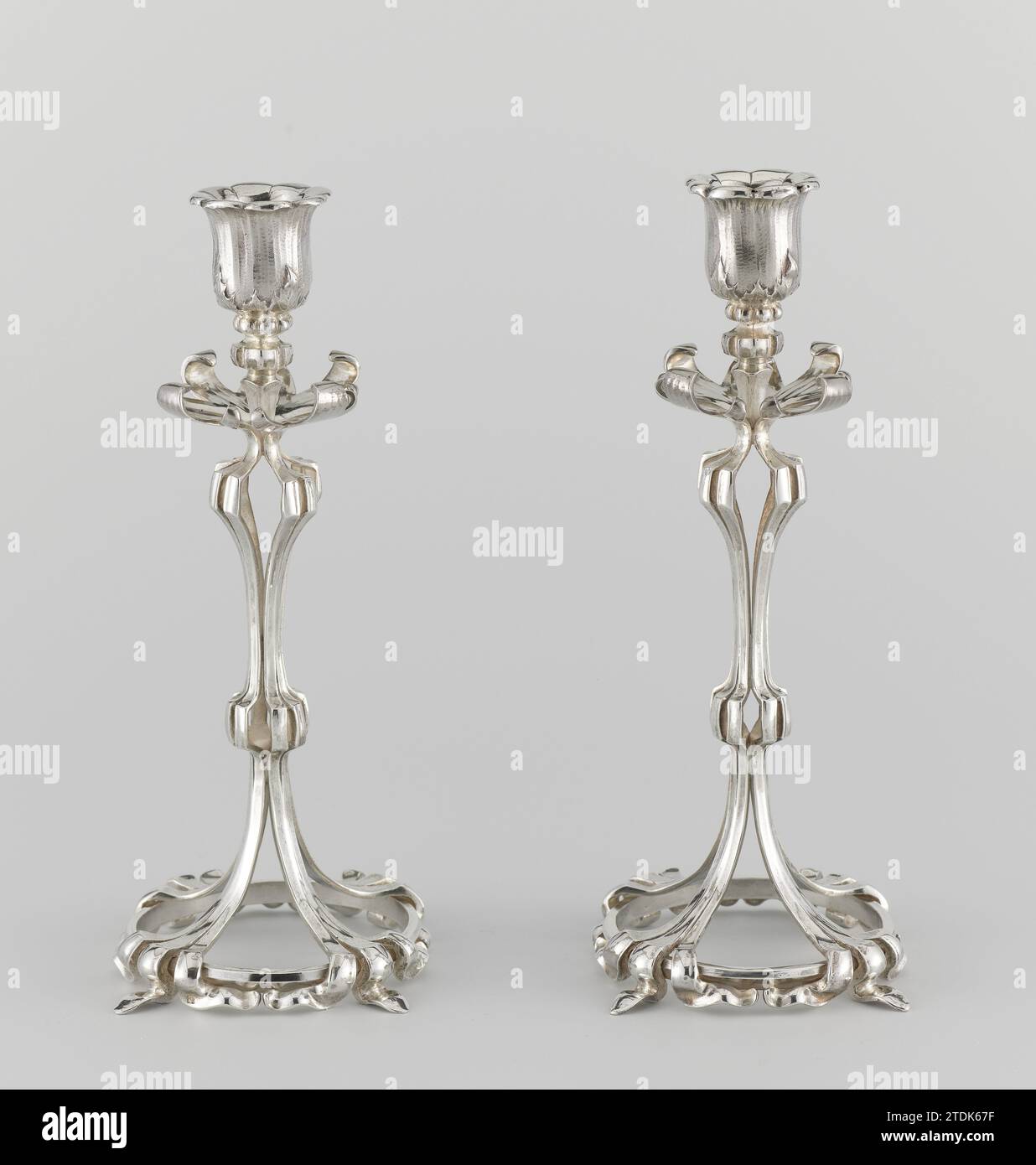 Set of two candlesticks, made up of Ranken, 1904 Two almost identical ...