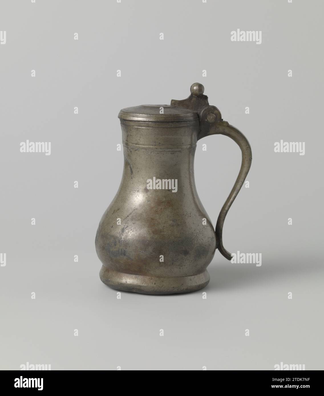 Tin drinking jug with lid and an agnus dei on the bottom, anonymous ...