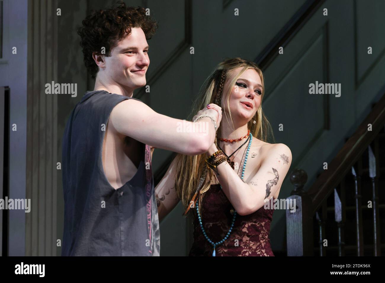 Graham Campbell, from left and Elle Fanning participate in the curtain ...