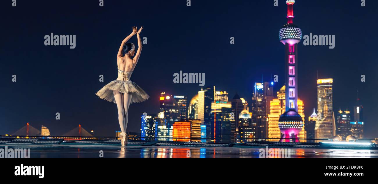 Dance ballet at night in a big city behind Stock Photo - Alamy