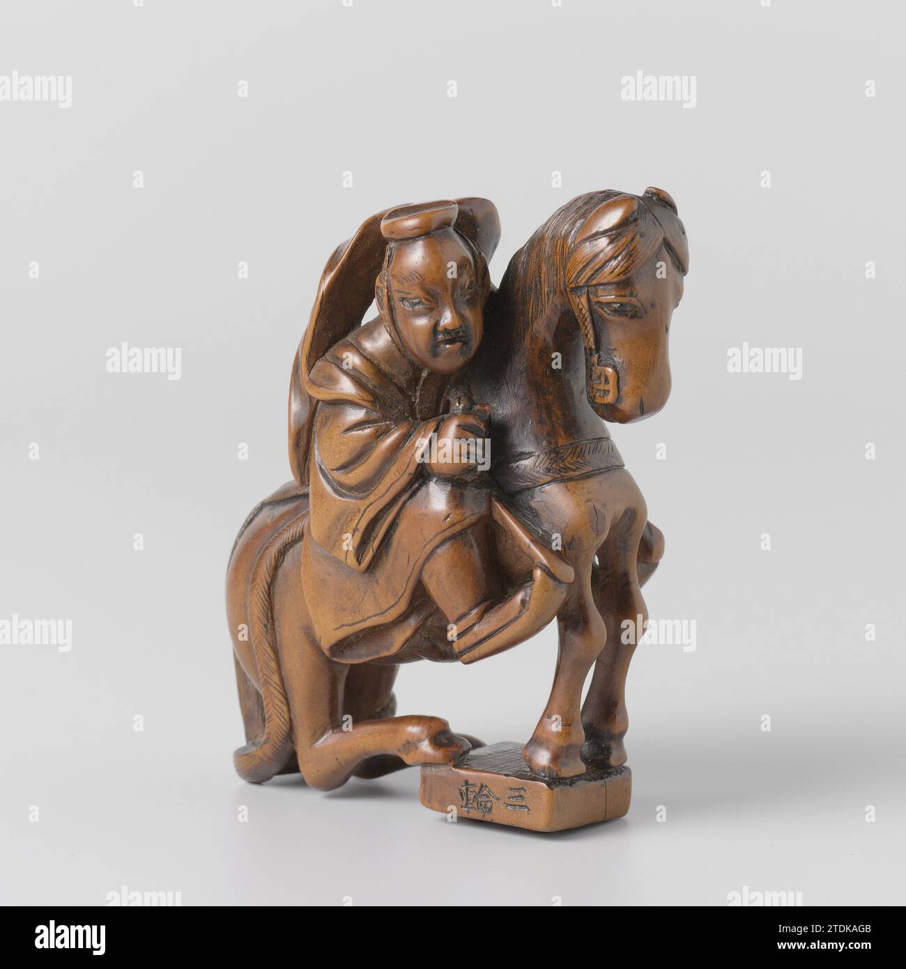 Netsuke, anonymous, 1850 - 1900 A rider who puts his horse with the ...