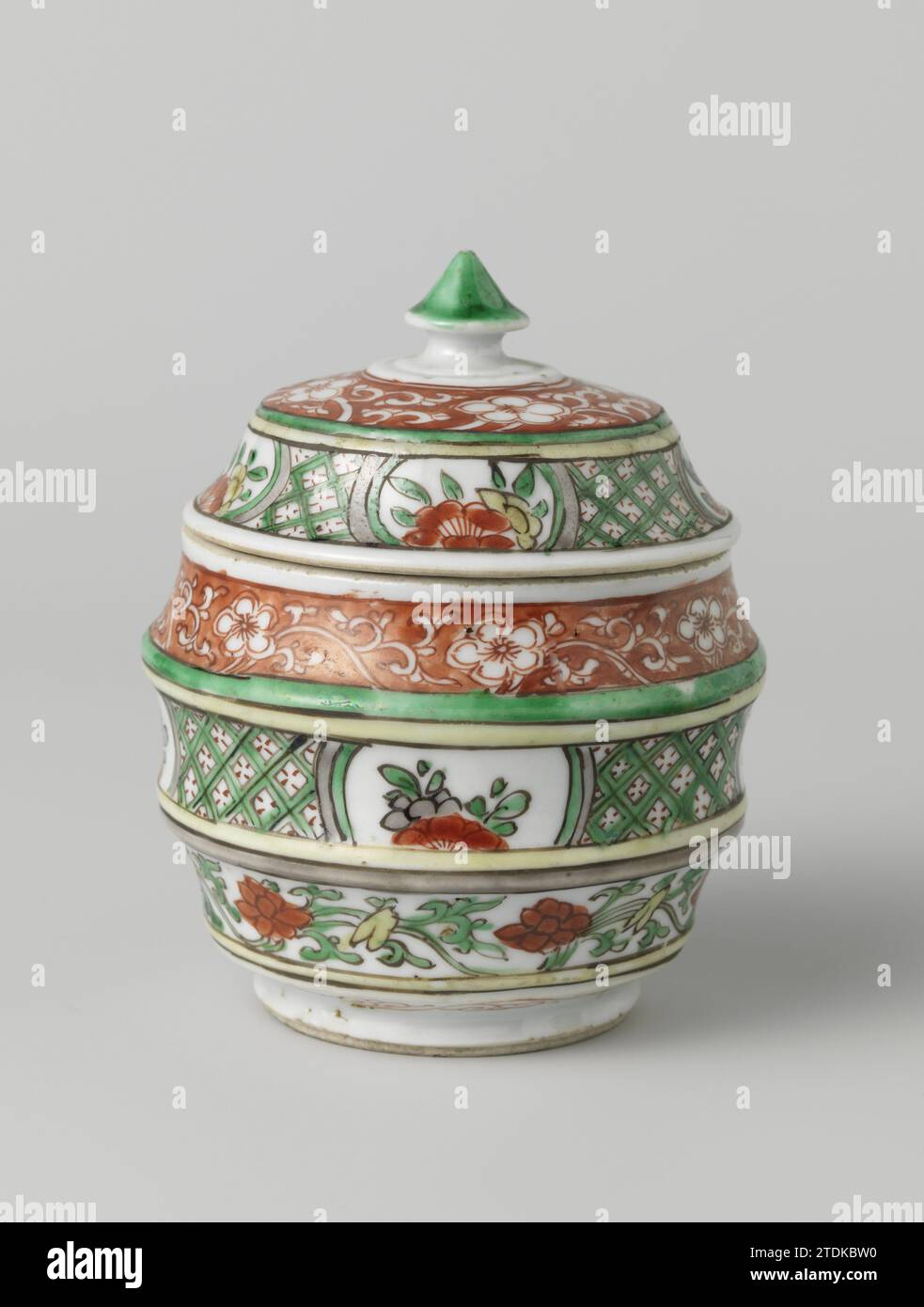 Barrel-shaped covered jar with flower scrolls and geometric patterns ...