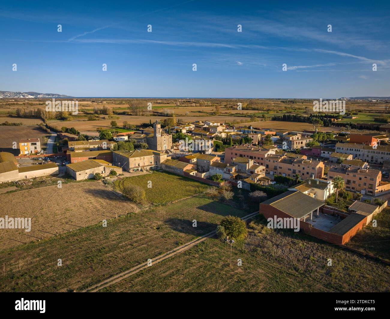 Aerial view of the village of Riumors and the fields and rural ...