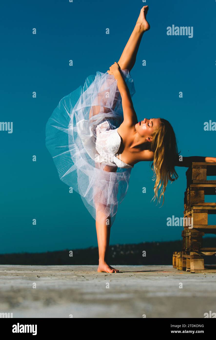 Beautiful female ballerina doing split hi-res stock photography and ...