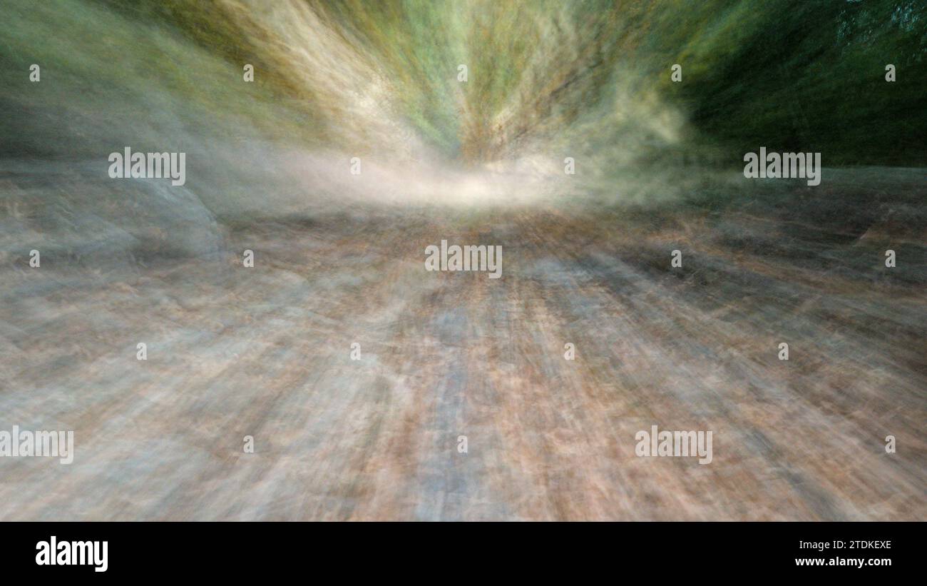 The abstract of autumn trees created by intentional camera movement ...