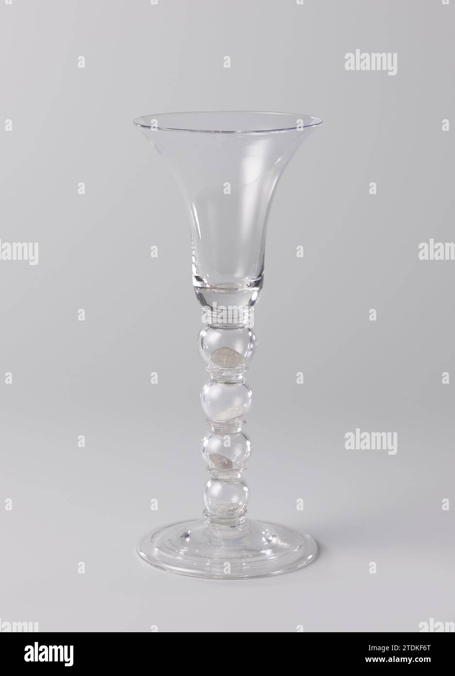 Chalip glass with four enclosed coins, anonymous, c. 1750 Chalice glass ...