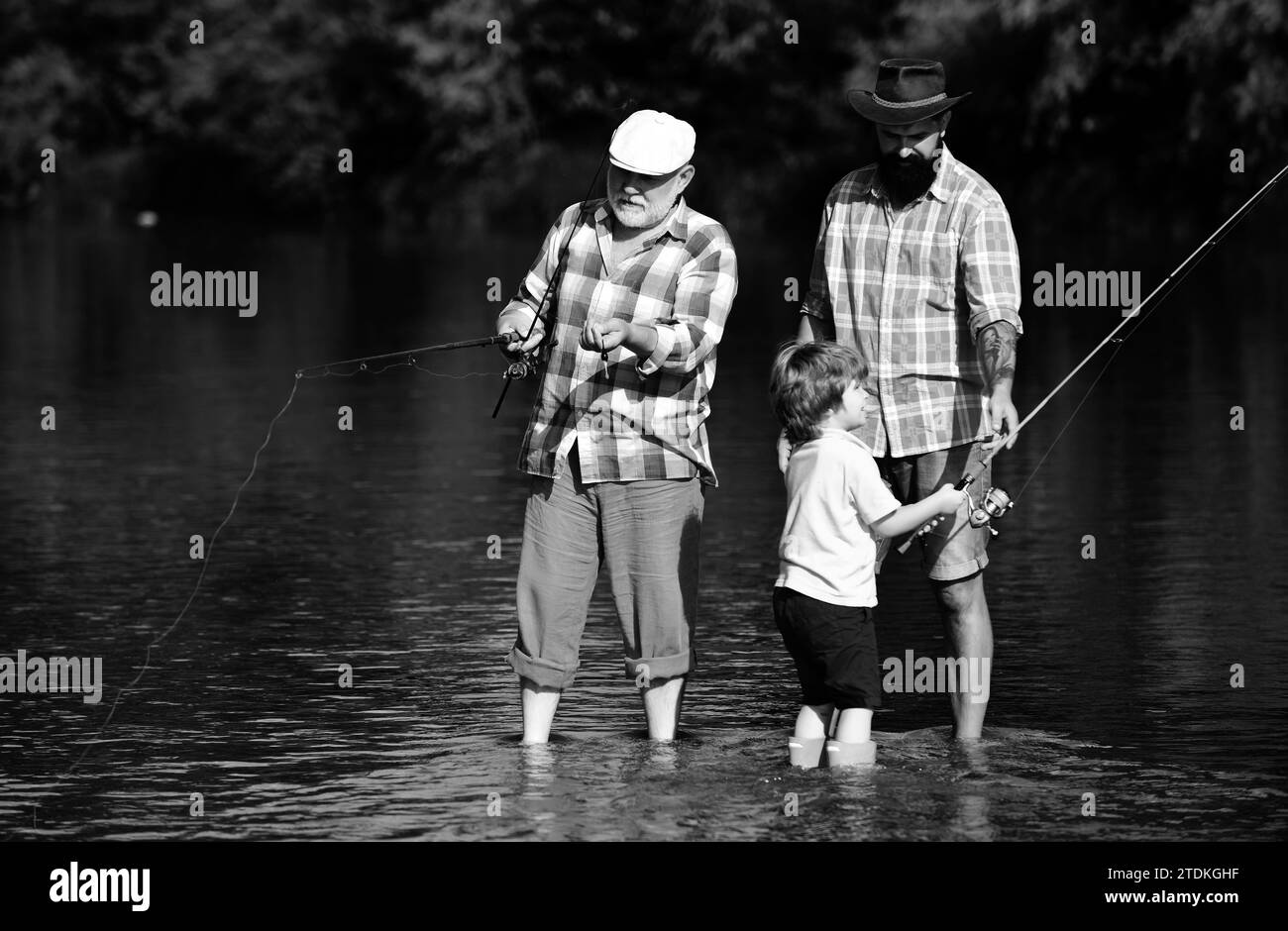 Boy grandfather fishing salmon hi-res stock photography and images - Alamy